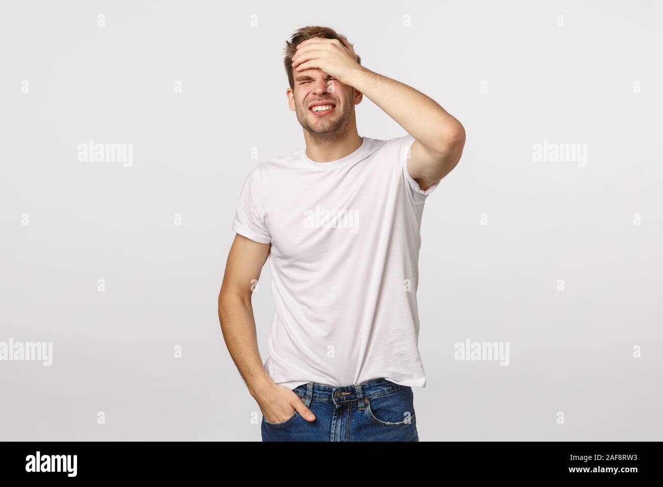 Man made huge mistake, punching forehead and squinting pissed, recall ...