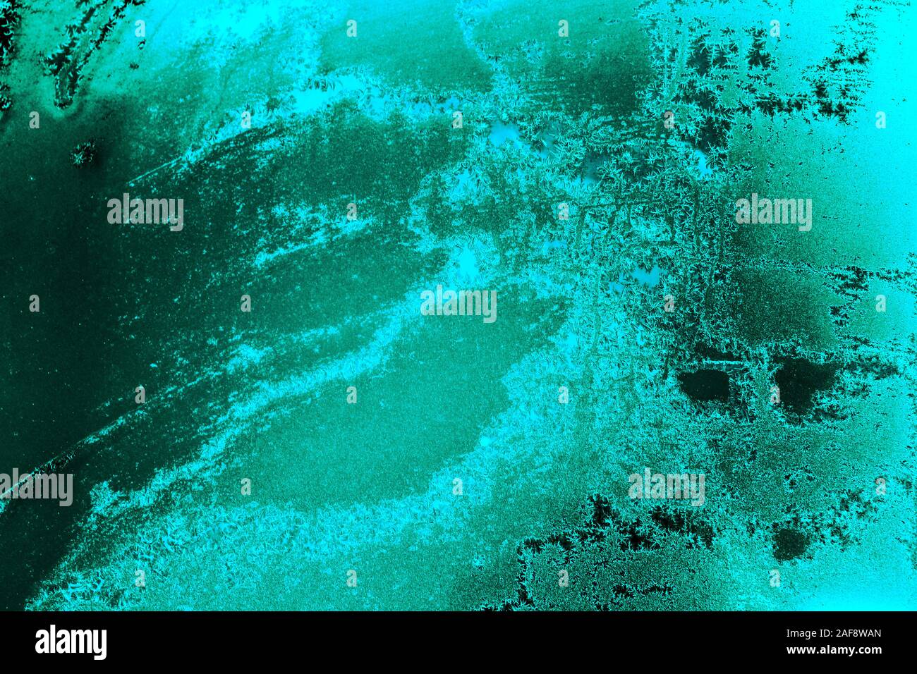 Turquoise colored background with ice textures of different shades of ...