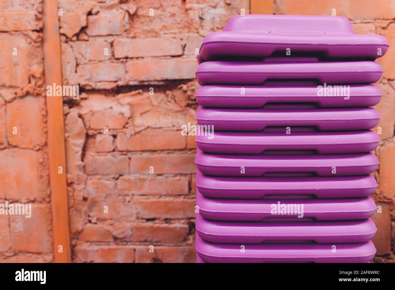 Receding row of weights lined up in a gym waiting for clients with ...