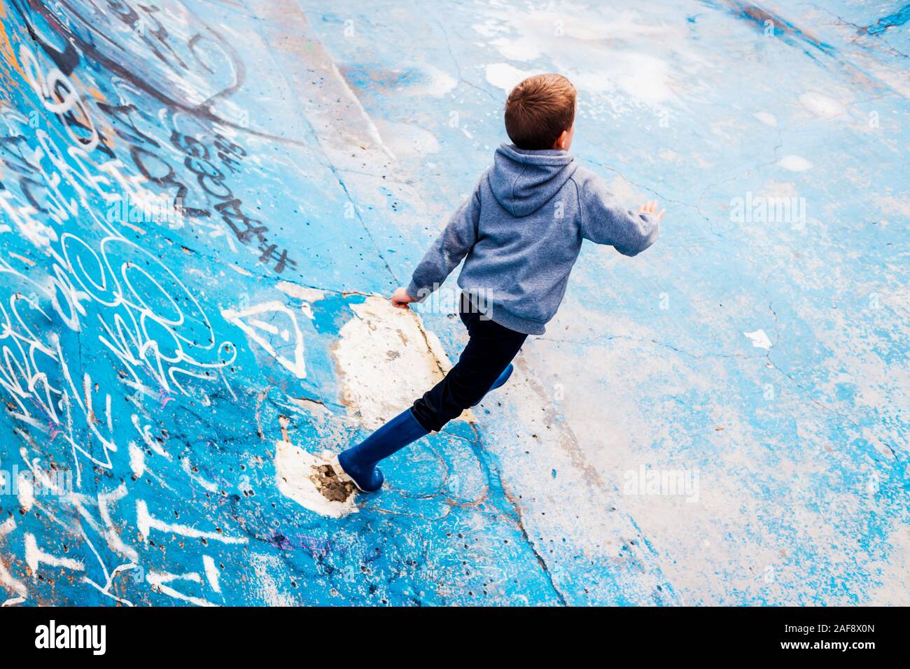 Person loitering in street hi-res stock photography and images - Alamy