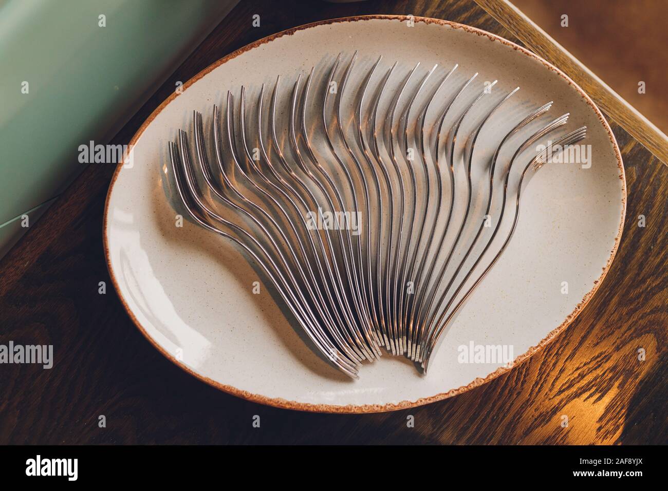 spoons, chopsticks, and plates set in buffet Stock Photo - Alamy