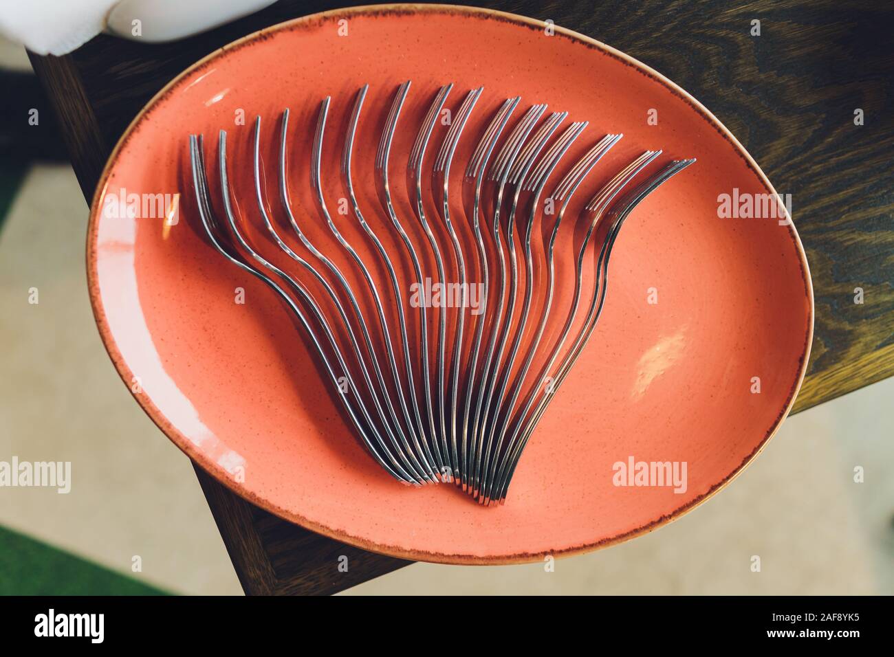 spoons, chopsticks, and plates set in buffet Stock Photo - Alamy