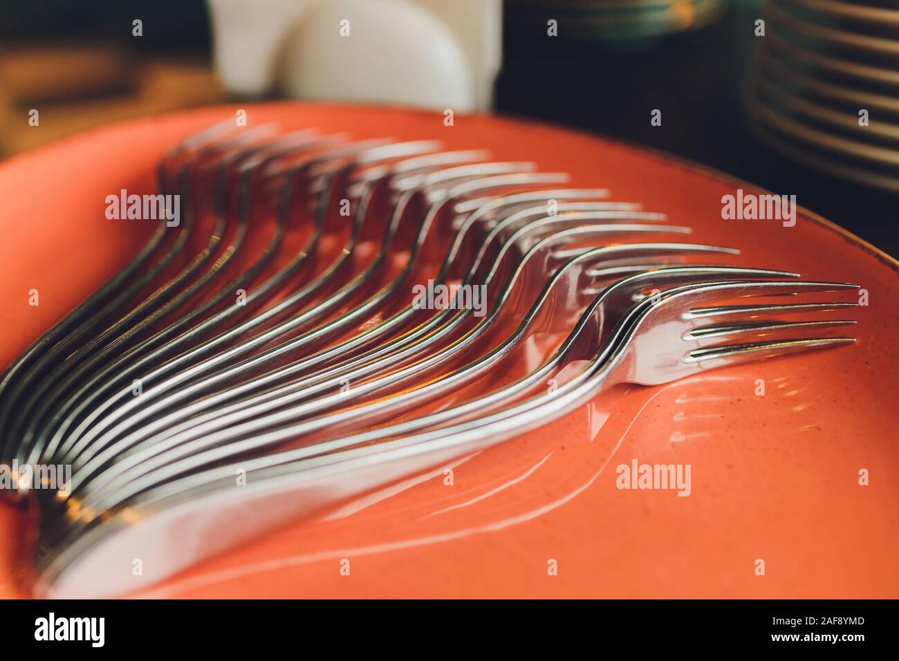 spoons, chopsticks, and plates set in buffet Stock Photo - Alamy