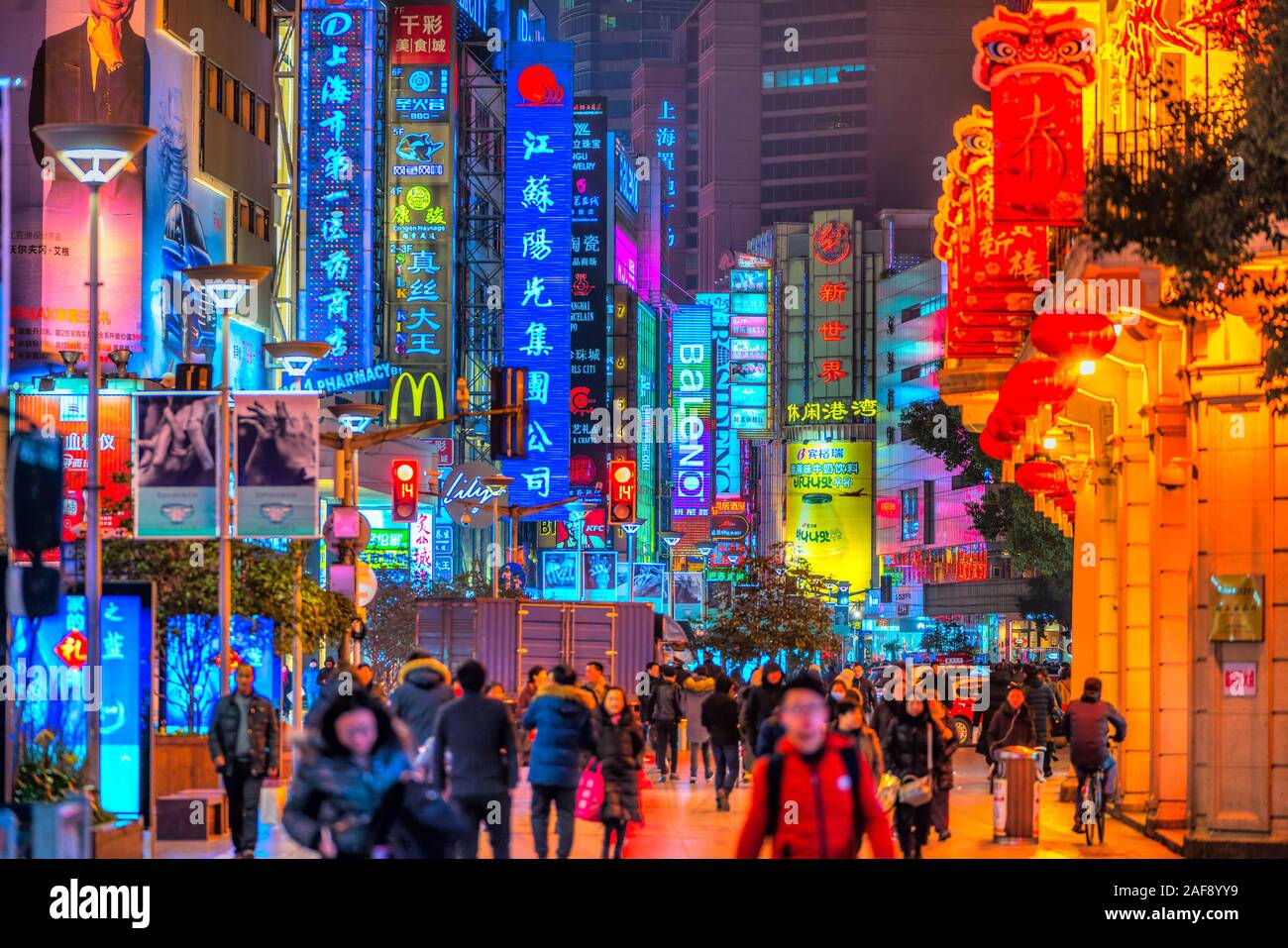 SHANGHAI, CHINA - FEBRUARY 18, 2018: Neon signs lit on Nanjing Road ...