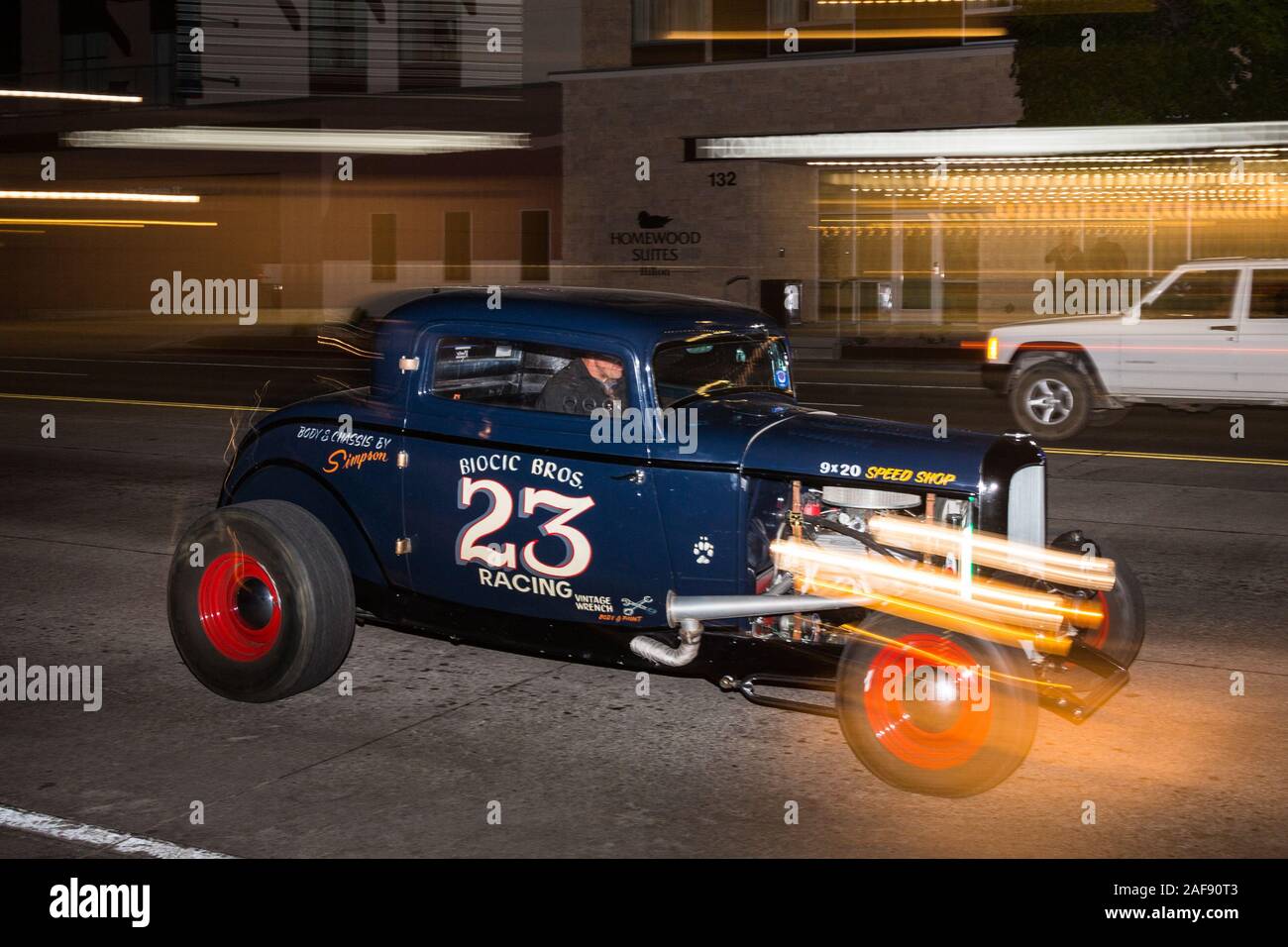 A restored and modified 1932 Ford Model B coupe hot rod cruising in the ...