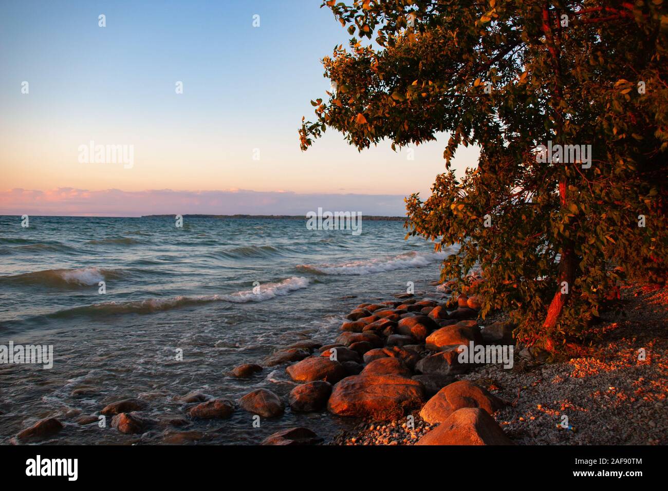 gold sunset on a simcoe lake Stock Photo - Alamy