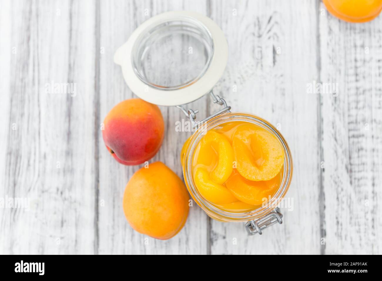 Pickled Apricots on a vintage background as detailed close-up shot ...