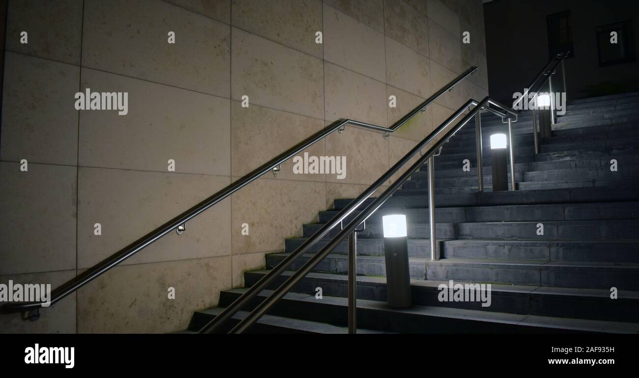 Night time steps outside an office block and apartment complex creating ...
