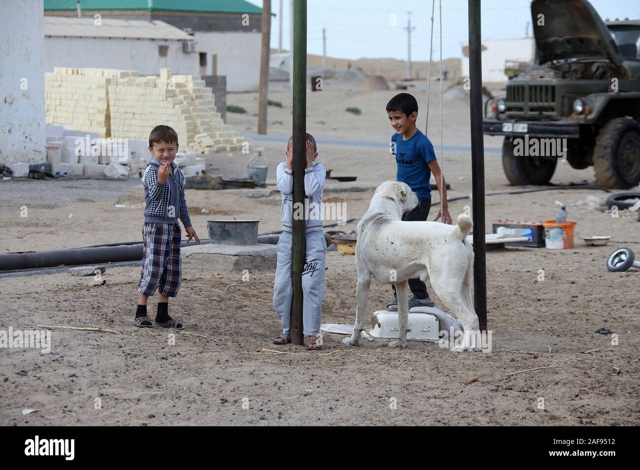 Children at Erbent village in the rural Karakum Desert area of ...