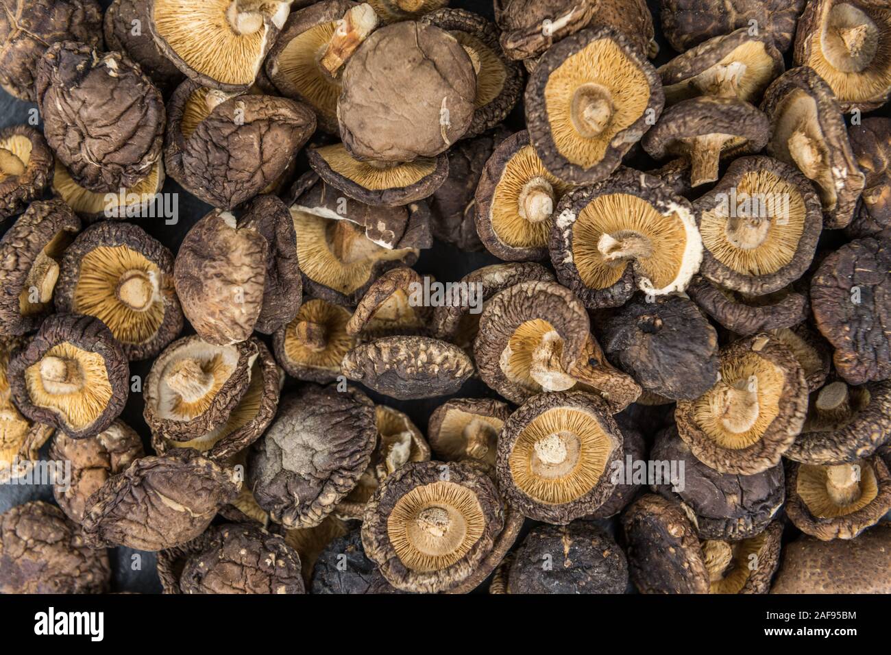 Dried Shiitake on a vintage background as detailed close-up shot ...