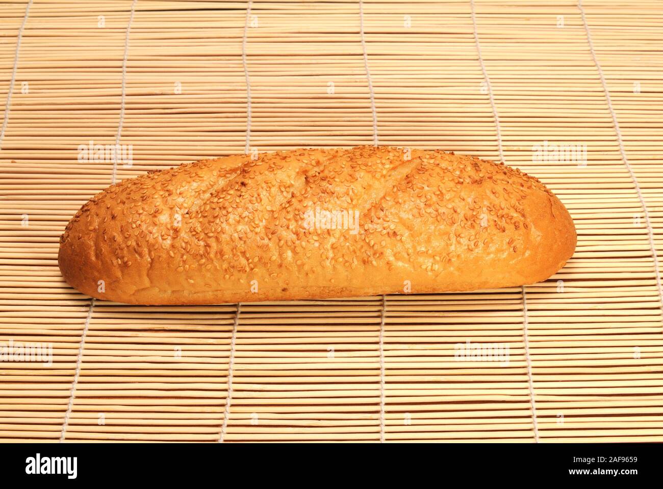 Mini French bread baguette with sesame seeds Stock Photo - Alamy