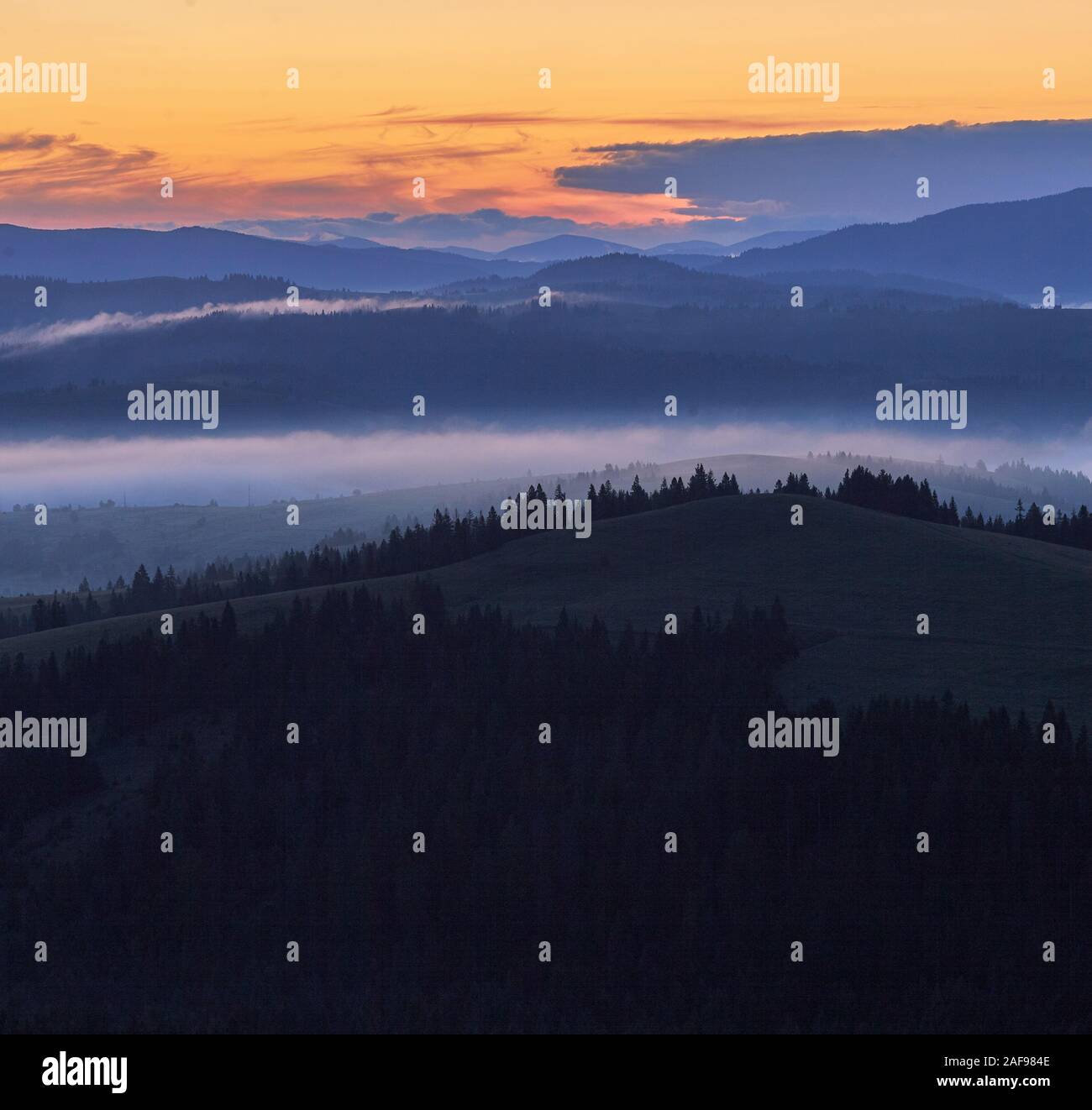 Sunrise fog over mountain hi-res stock photography and images - Alamy