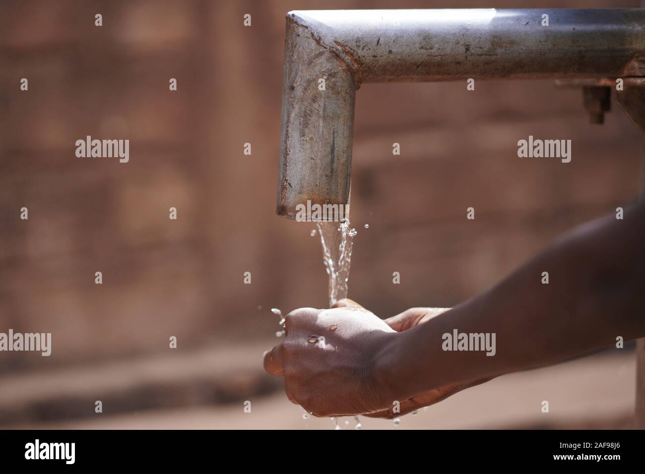 Black Native African Ethnicity Drinking Fresh Water in Bamako, Mali ...