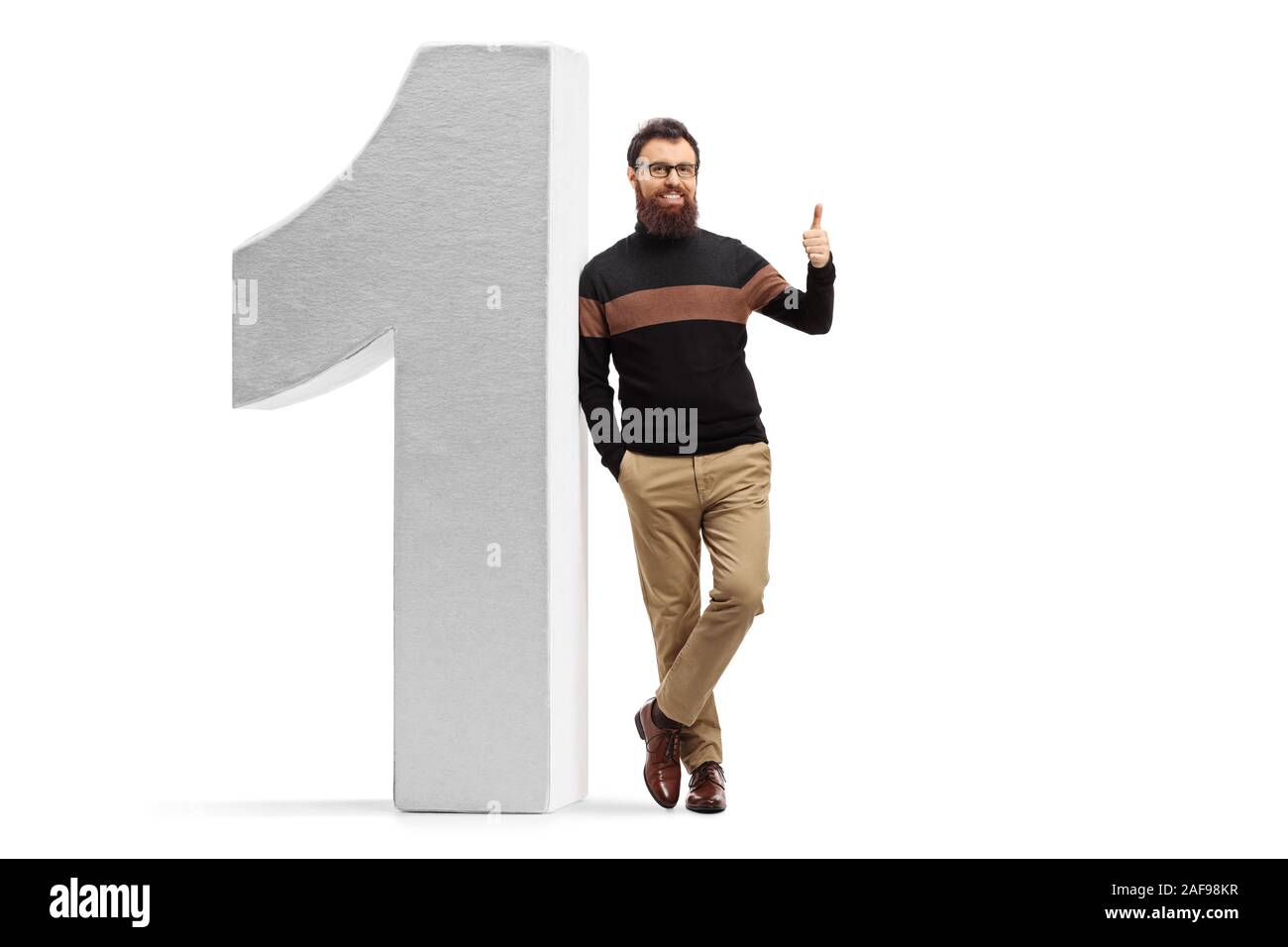 Full length portrait of a bearded guy leaning on number one with thumbs ...