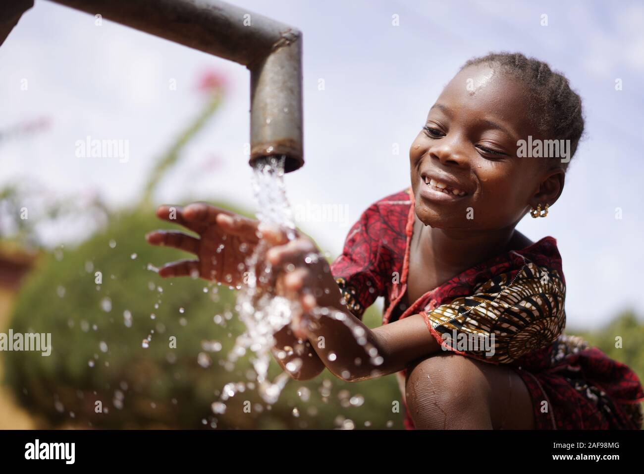 Water is Life for African Children, Little Gorgeous Black Girl Drinking ...