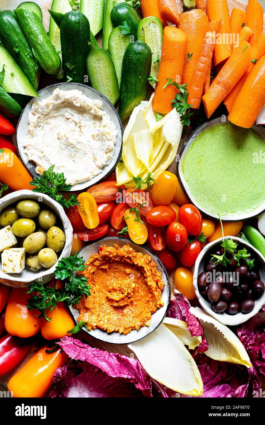 Assorted Raw Vegetable Appetizer Platter with three dips Stock Photo ...