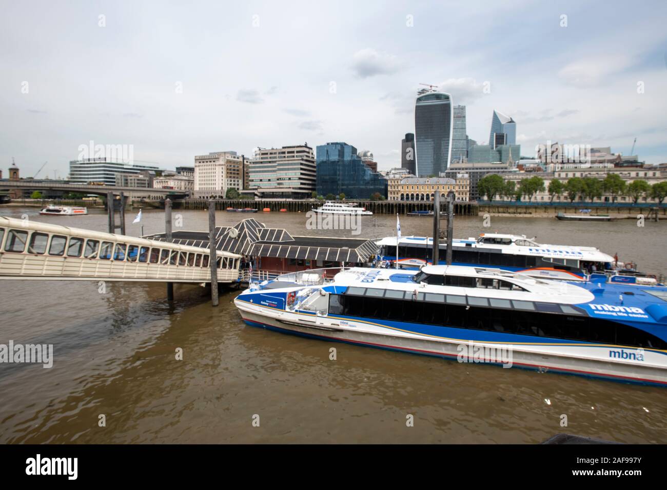 Water bus at pier London Bridge, London Stock Photo - Alamy