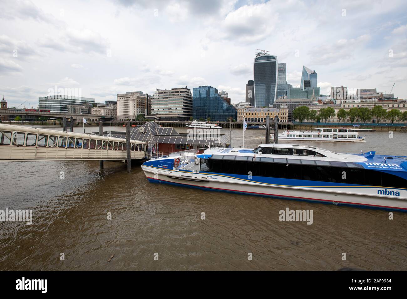 Water bus at pier London Bridge, London Stock Photo - Alamy