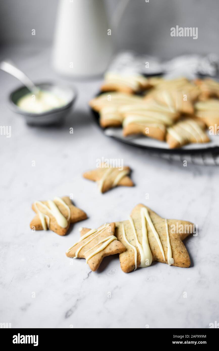Chai Spiced Star Tea Biscuits With White Chocolate Drizzle Stock Photo ...