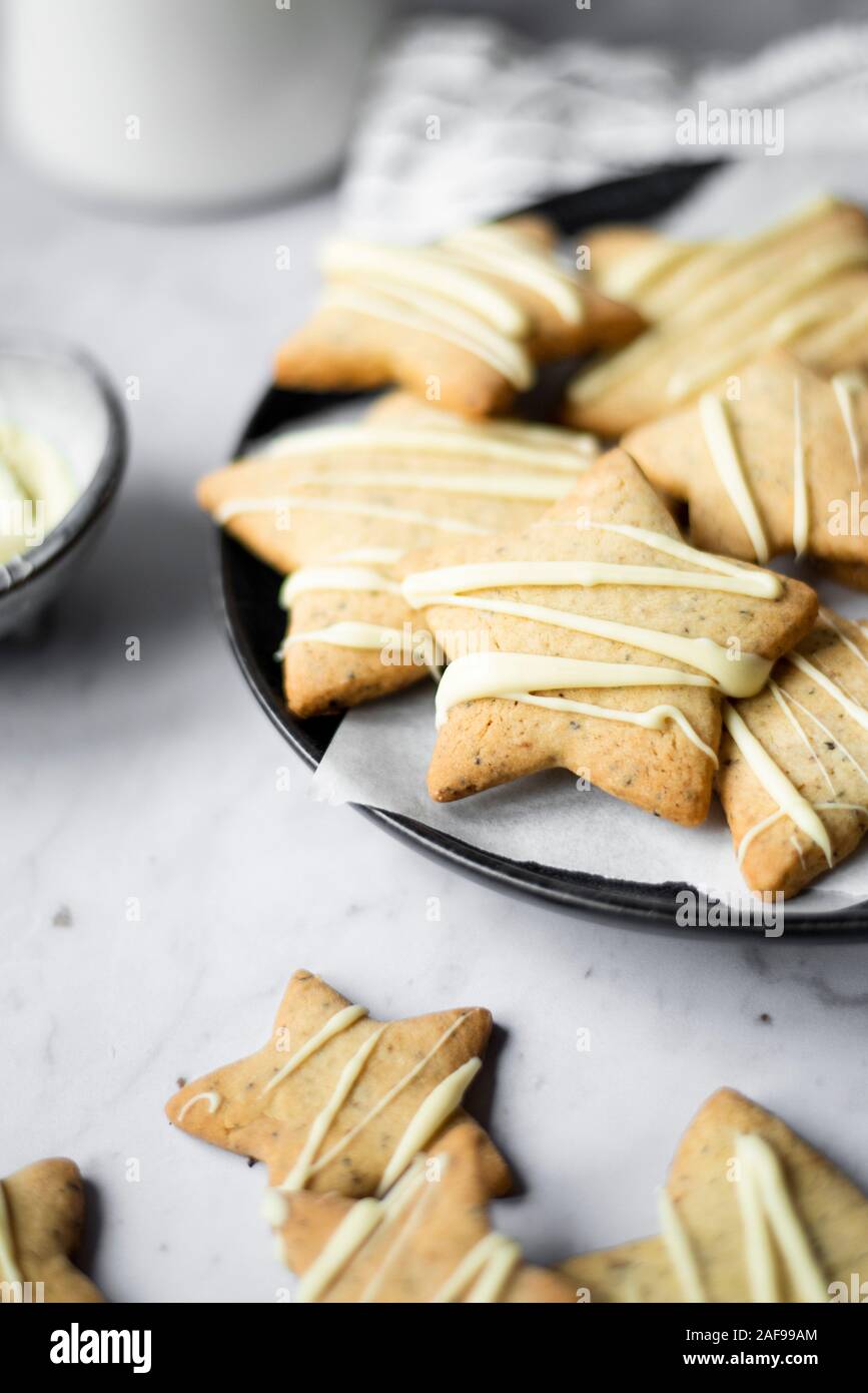 Chai Spiced Star Tea Biscuits With White Chocolate Drizzle Stock Photo ...
