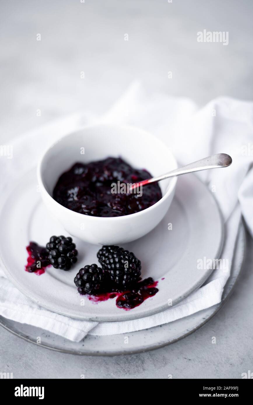 Blackberry Jam On A Simple White Backdrop Stock Photo - Alamy
