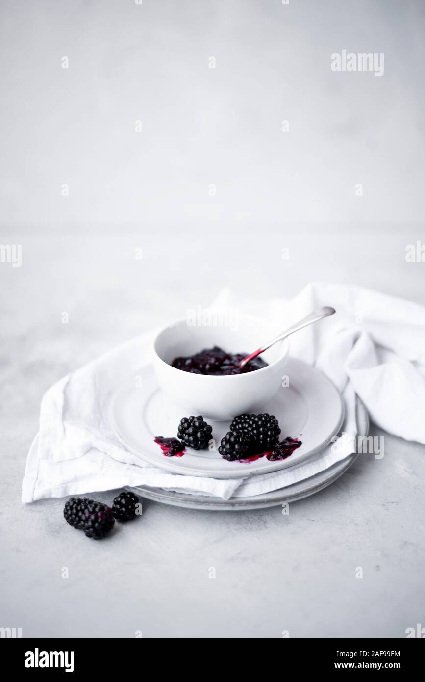 Blackberry Jam On A Simple White Backdrop Stock Photo - Alamy