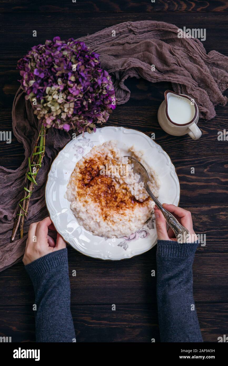 Woman eating rice pudding hi-res stock photography and images - Alamy