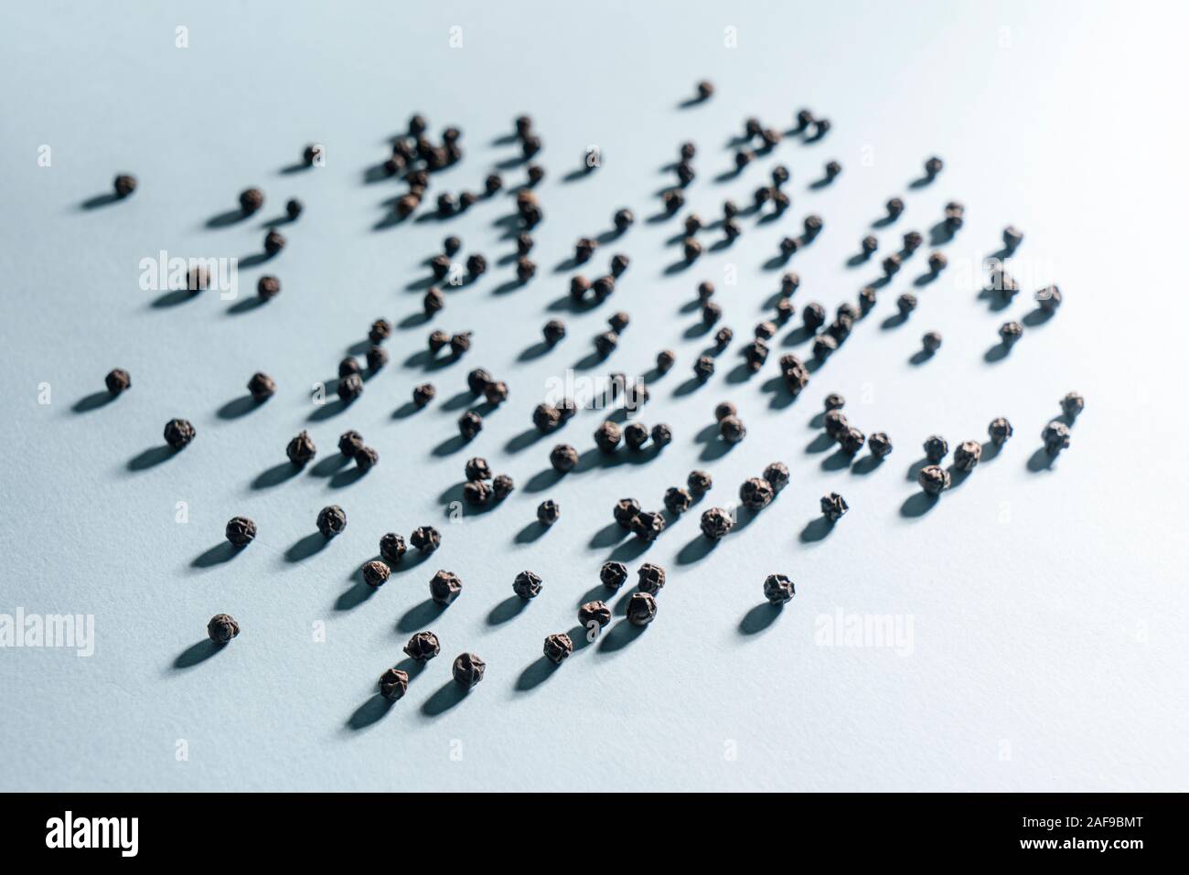 Black pepper grains hi-res stock photography and images - Alamy