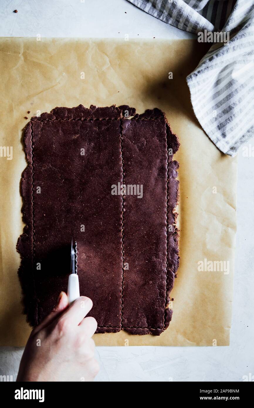 Making chocolate biscuit squares hi-res stock photography and images ...