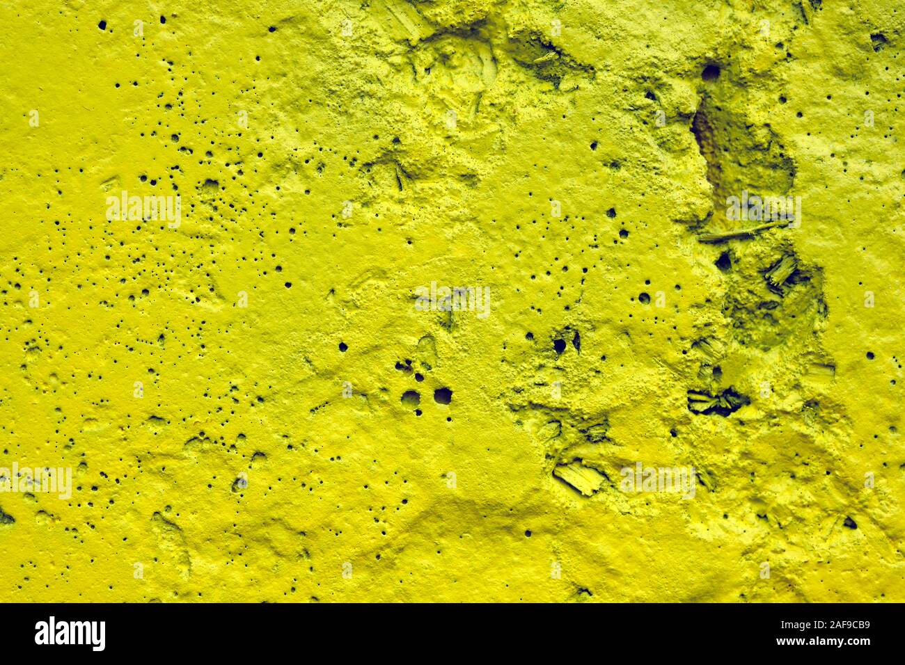texture of a painted wall. cement plate yellow color background. wall ...