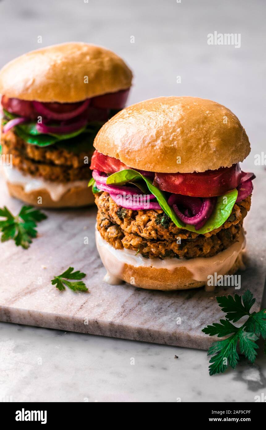 Sweet Potato Chickpea Burgers on a marble background Stock Photo - Alamy