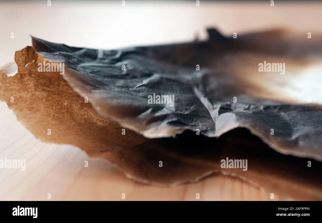 Burnt paper hi-res stock photography and images - Alamy
