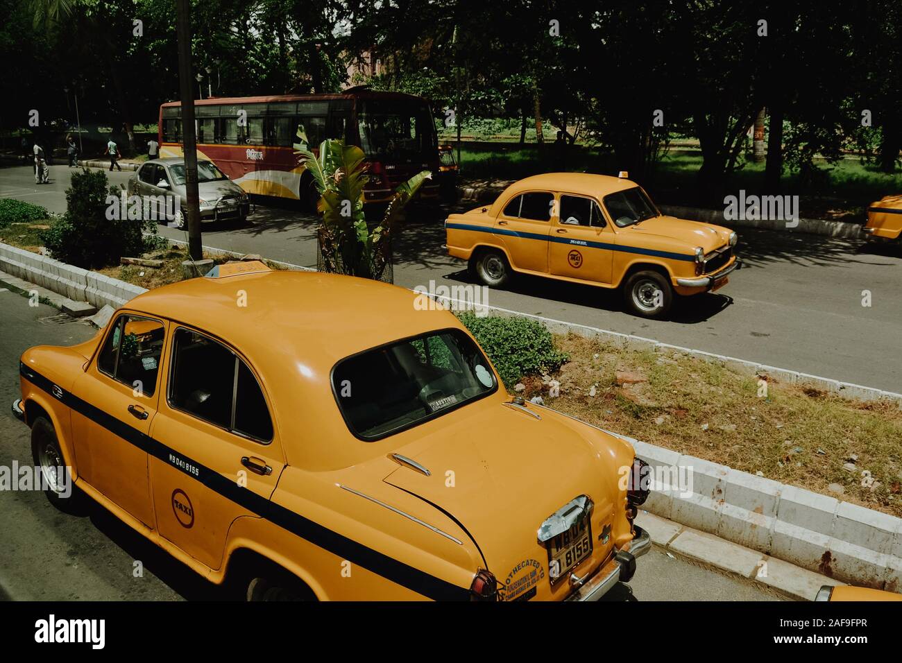 Old yellow taxi cab in India Stock Photo - Alamy
