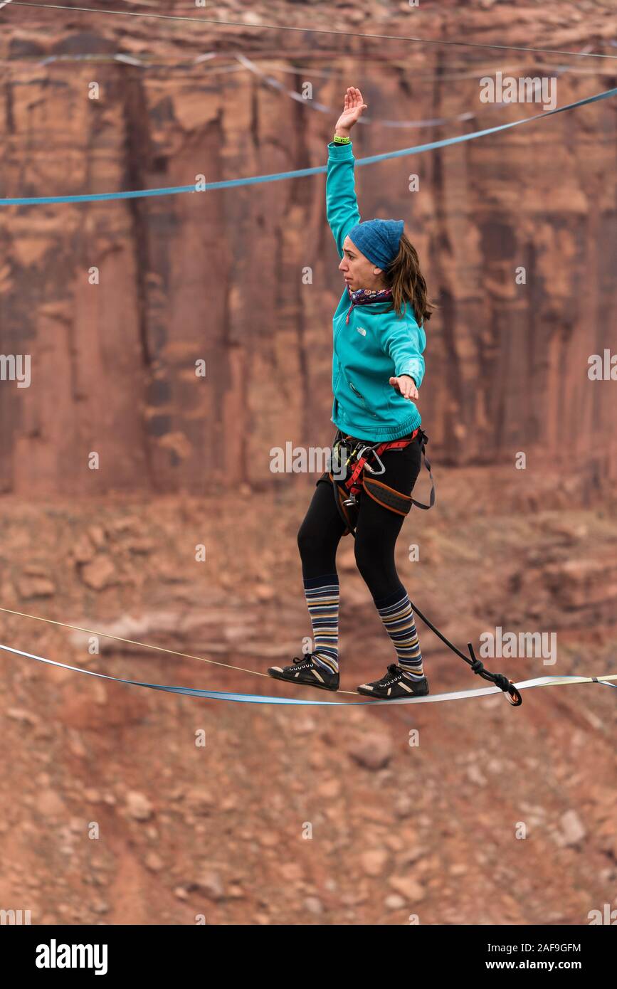 A young woman slacklining or highlining hundreds of feet above Mineral ...
