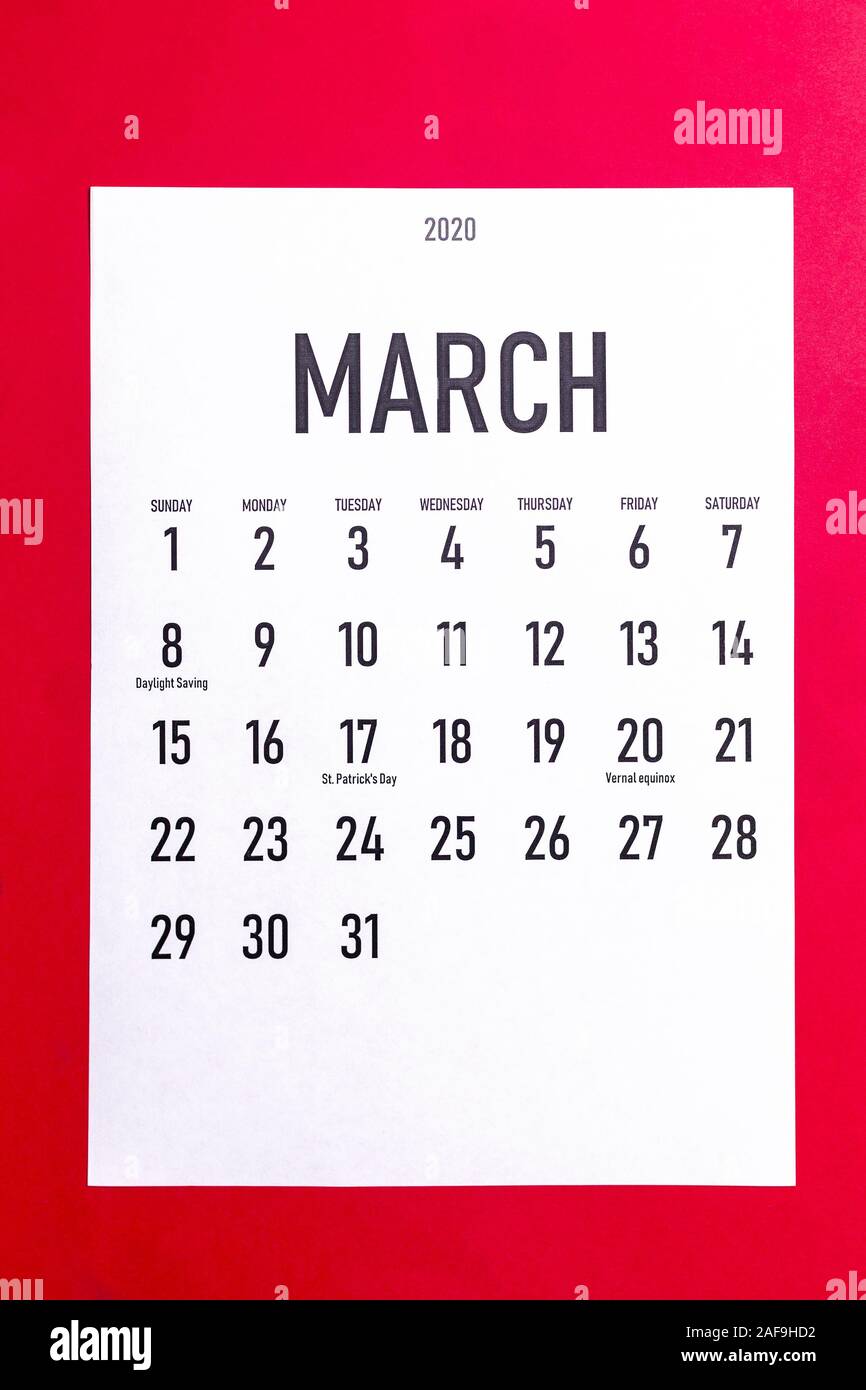 March 2020 calendar with holidays on red paper background Stock Photo ...