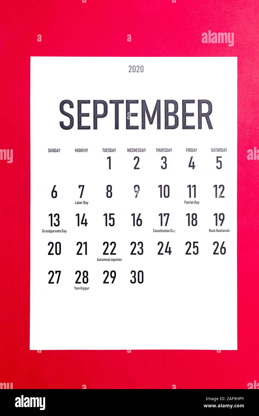 September 2020 calendar with holidays on red paper background Stock ...