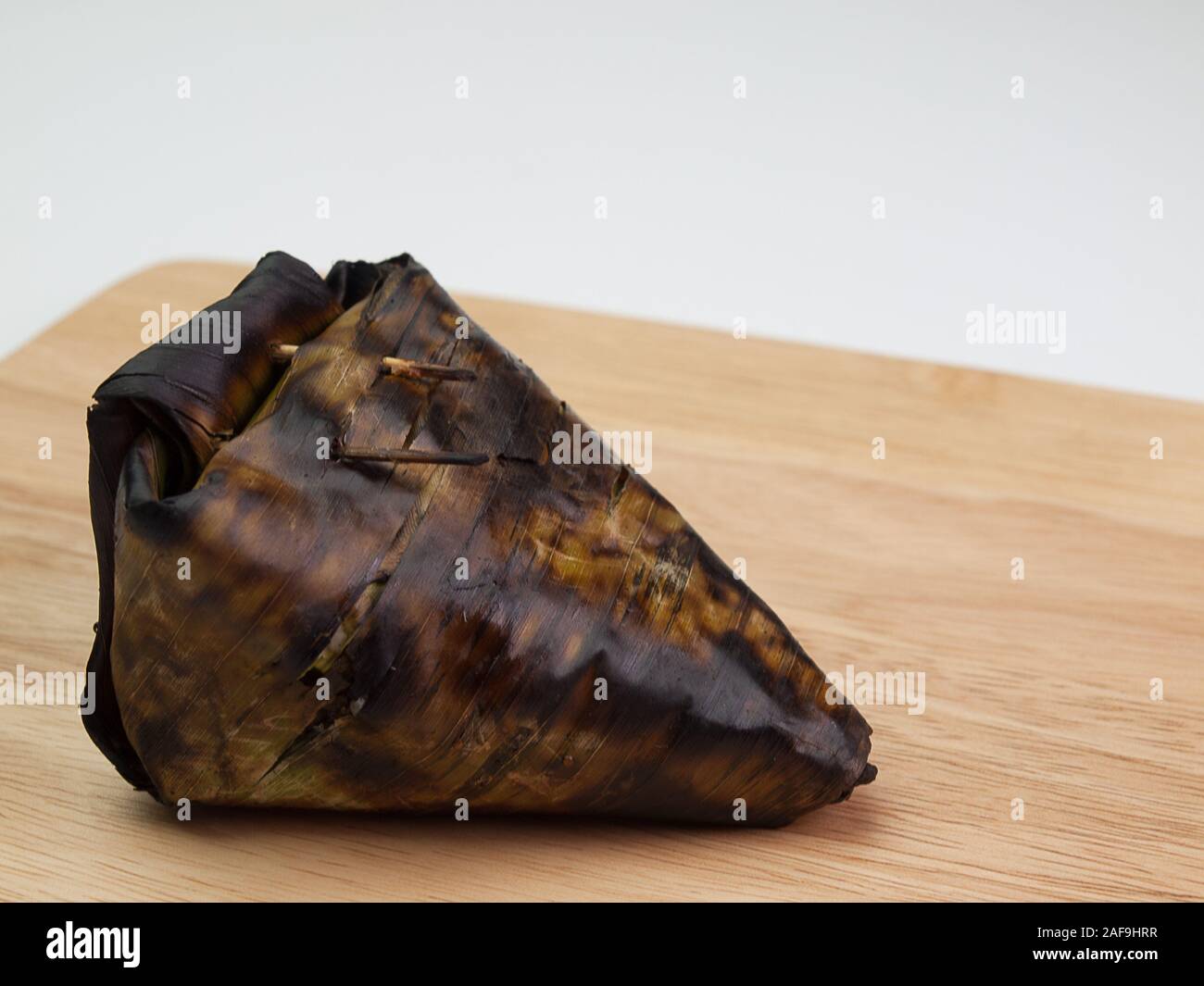 Grilled Sticky Rice with taro , Thai food Stock Photo - Alamy