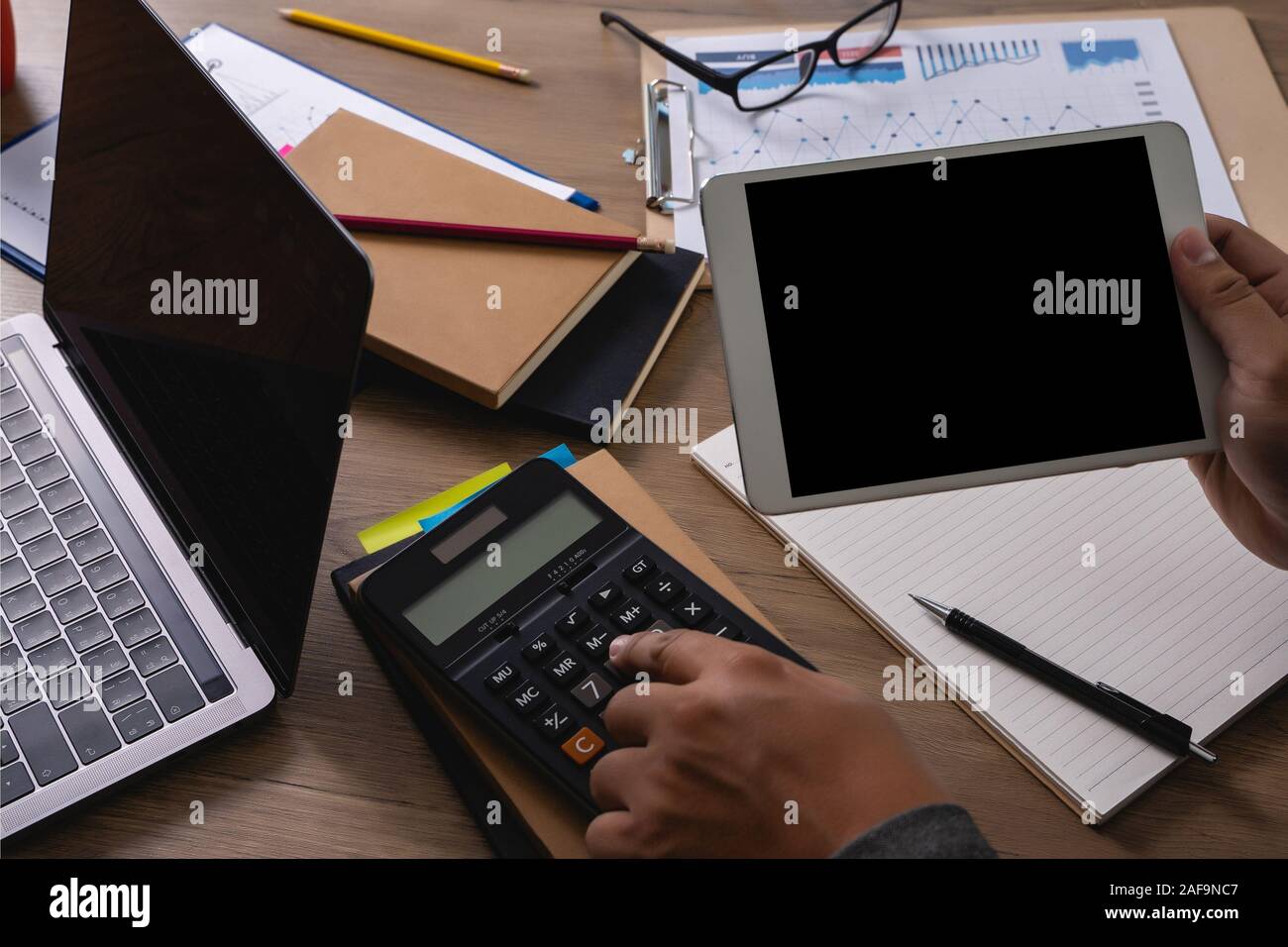 man of business laptop man hand working on laptop computer on wooden ...