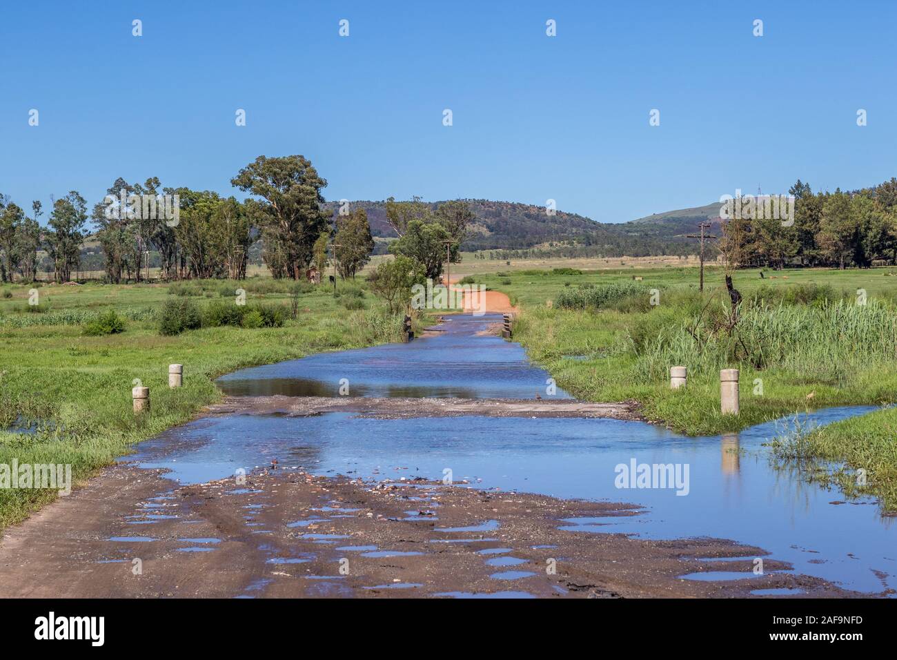Flooded sand road in the south of Johannesburg, South Africa after very ...