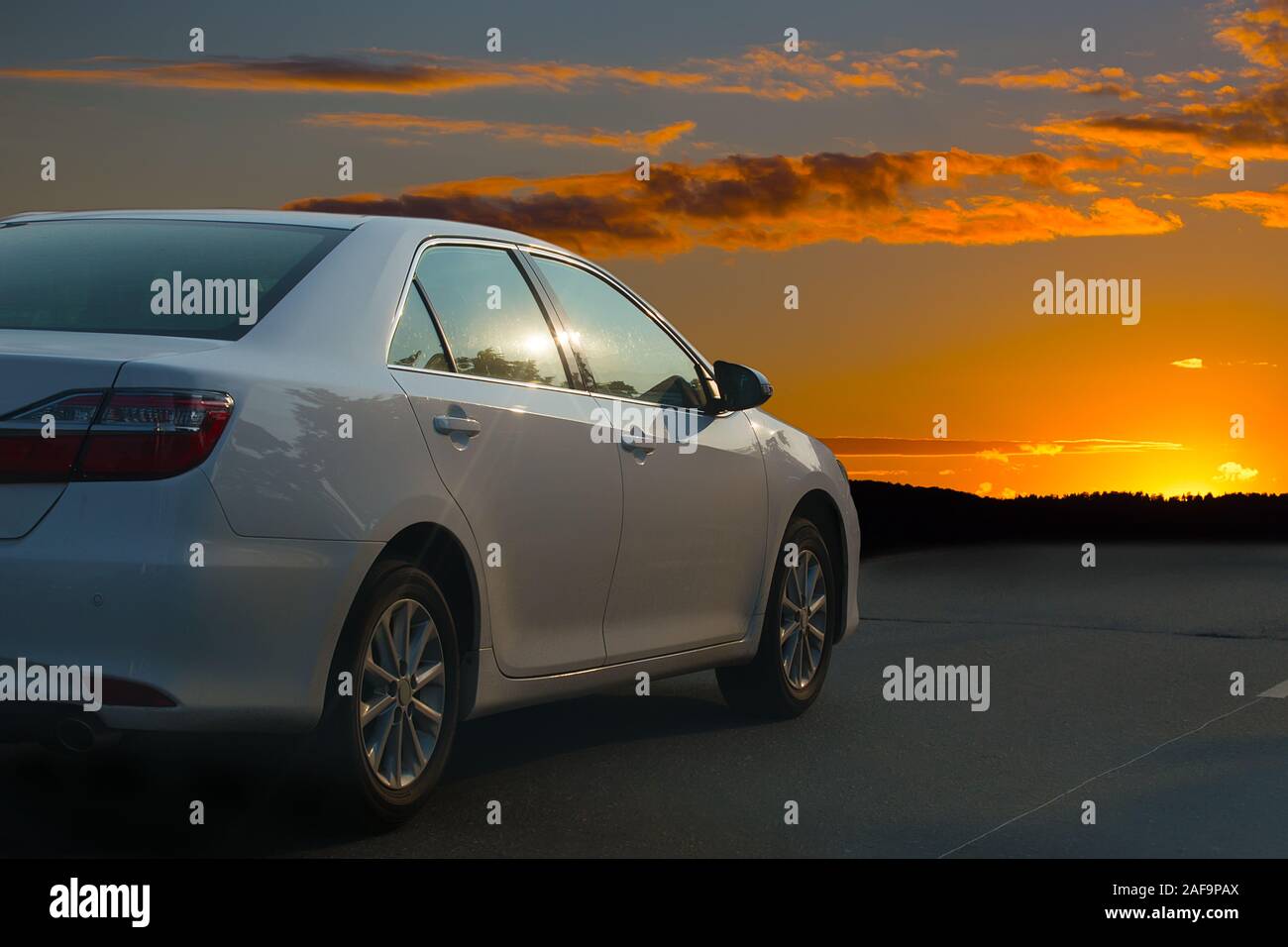 car goes on the way to decline background Stock Photo - Alamy