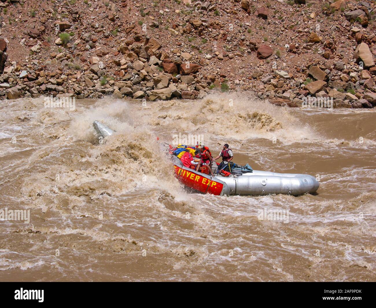 A 33' S-rig raft navigates through the Big Drop II rapid in Cataract ...