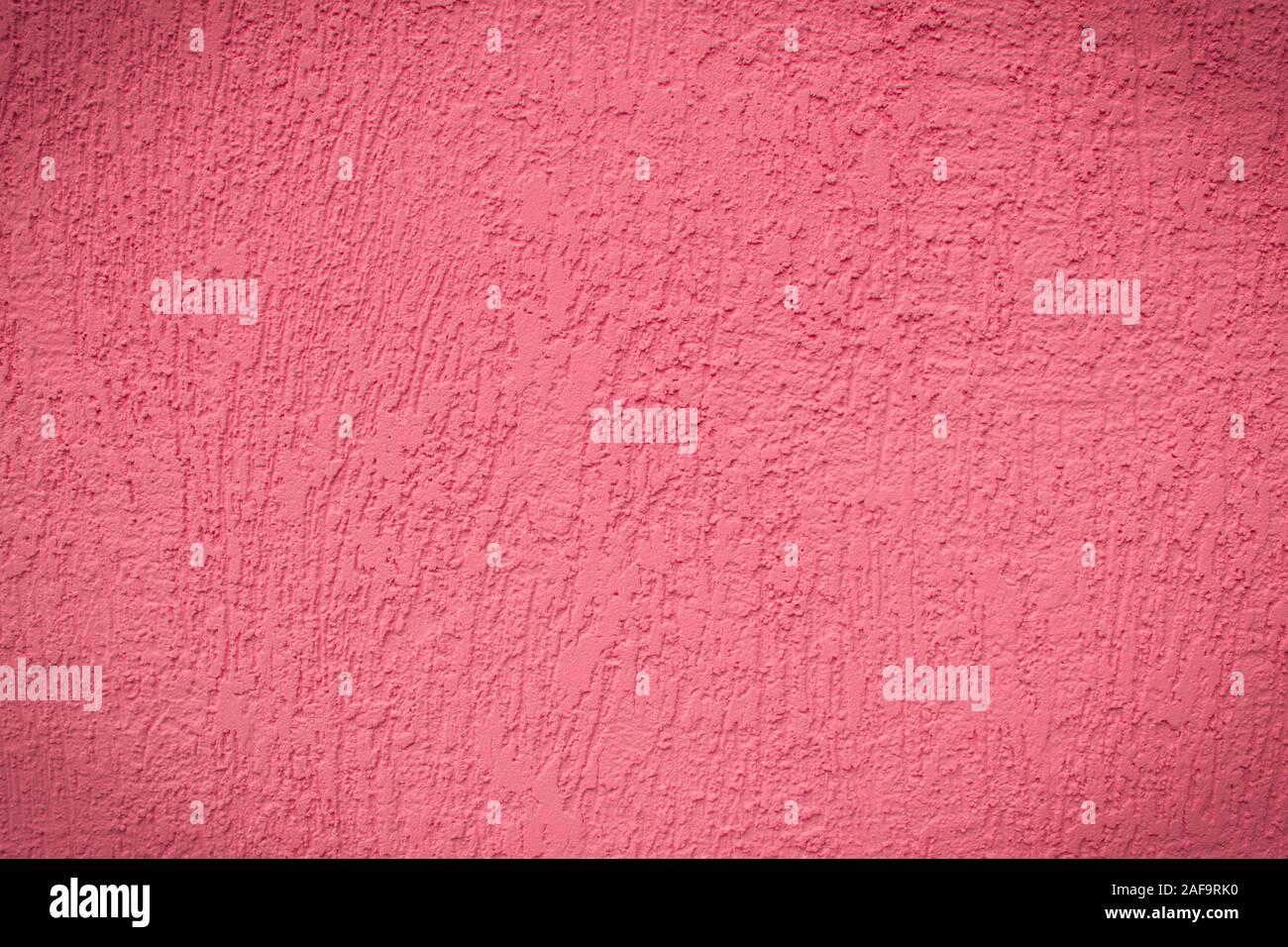 Pink cement and concrete wall as background texture, copy space for ...