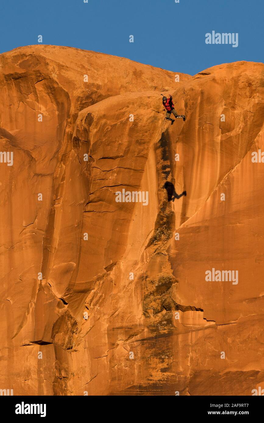 A BASE jumper in free fall off the 400 foot vertical face of the ...