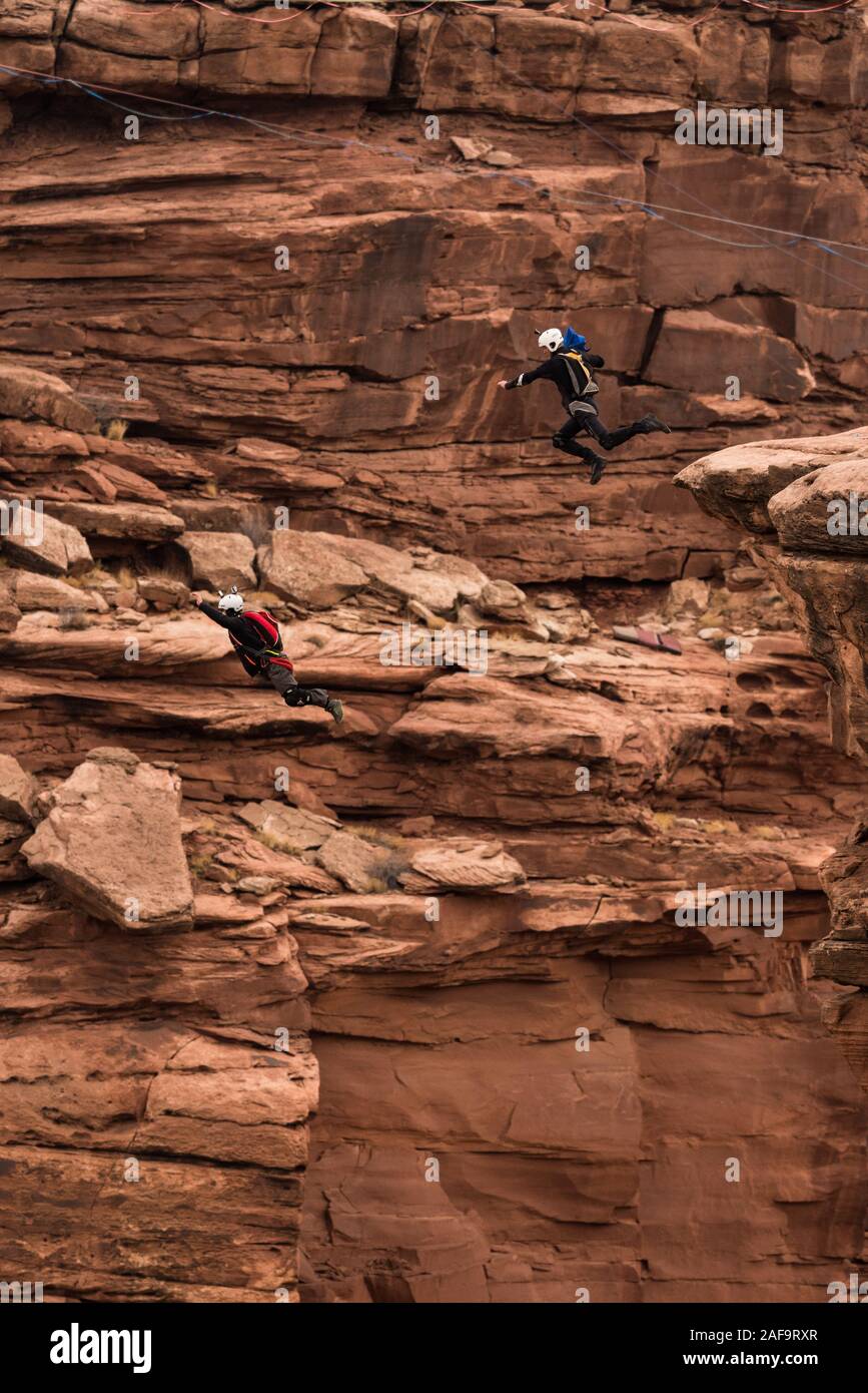 Two BASE Jumpers jump off the clifftop 950 feet above the floor of ...