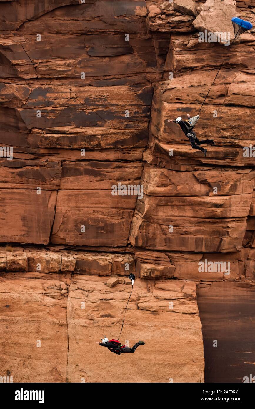 Two BASE Jumpers jump off the clifftop 950 feet above the floor of ...