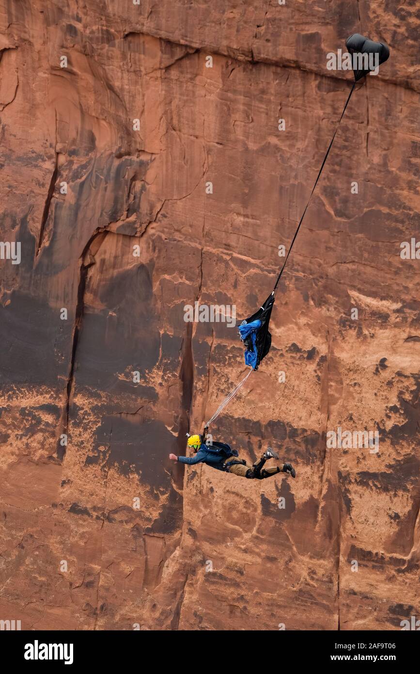 A BASE jumper free-falls from the clifftop 950 vertical feet above the ...