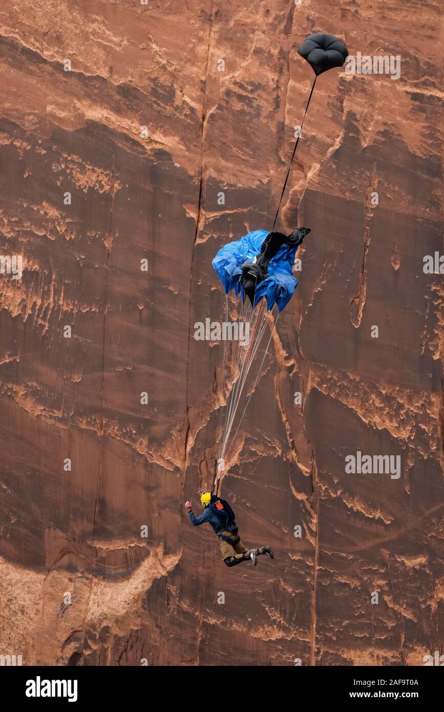 A BASE jumper free-falls from the clifftop 950 vertical feet above the ...