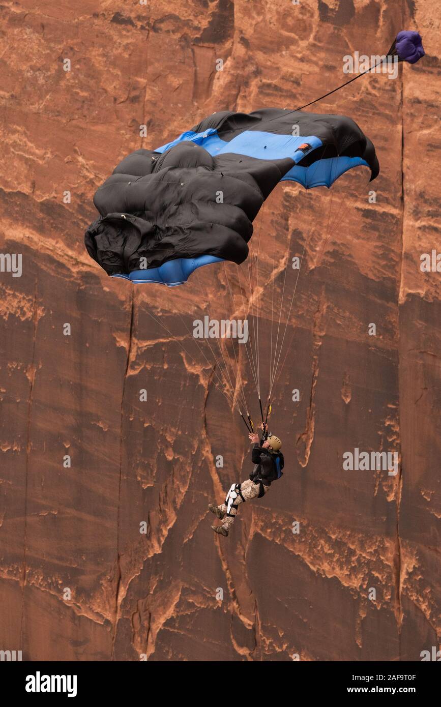 A BASE jumper's main chute opens after jumping from the clifftop 950 ...