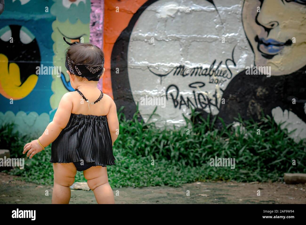 The little Girl at graffiti park Outdoor Stock Photo - Alamy