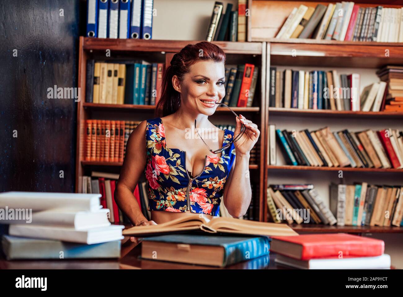 Librarian sits hi-res stock photography and images - Alamy